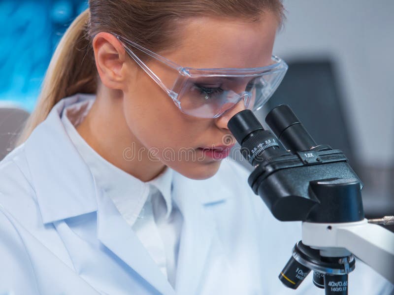 Female Doctor Works in a Modern Scientific Laboratory Using Equipment ...