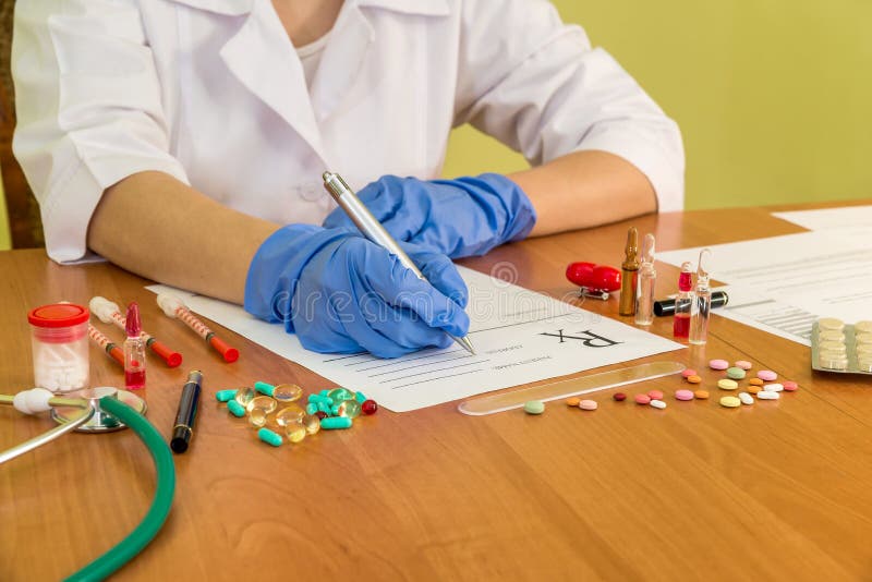Female Doctor Writing Prescription Paper. Stock Image - Image of hands ...