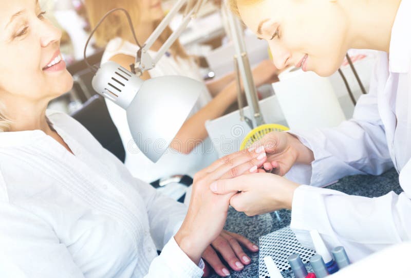 Female doing manicure stock image. Image of female, accurate - 94488573
