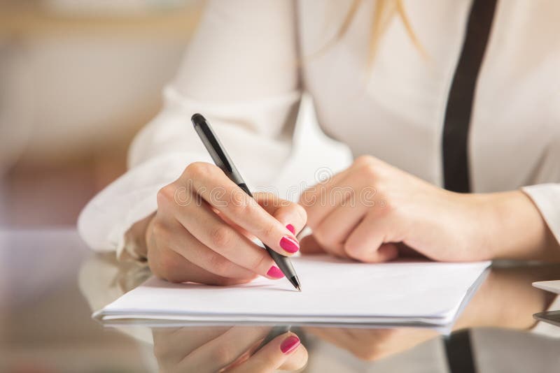 Female doing paperwork stock image. Image of blurry, manager - 90121151