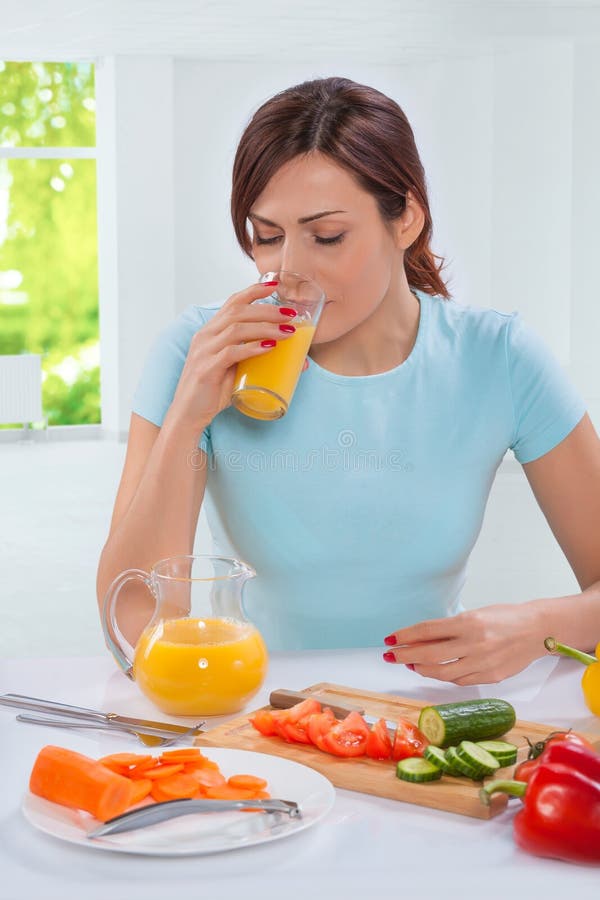 Female Drinking Juice from Glass Stock Photo - Image of cucumber, board ...