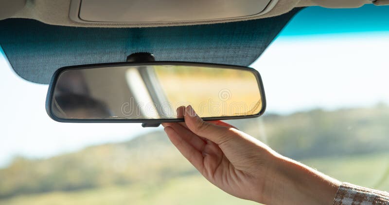 Female Driver Adjusting Mirror and Driving Car Stock Image - Image of ...