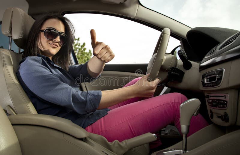 Female driver stock image. Image of brunette, road, lady - 64299195