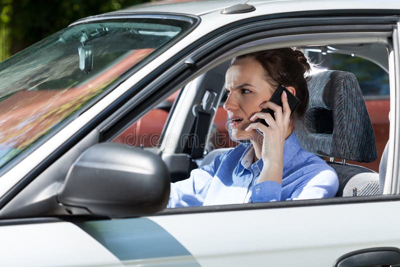 Female Driver Calling on Mobile Phone Stock Image - Image of close ...
