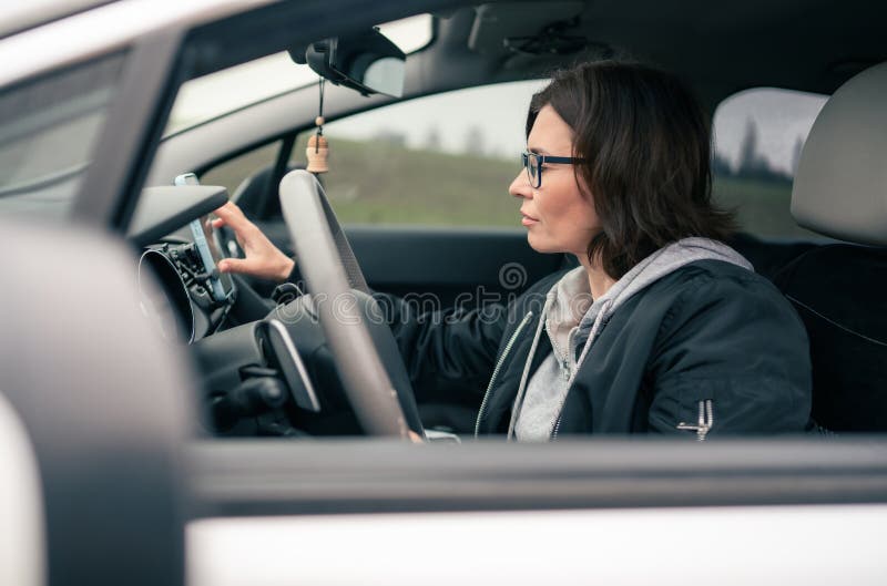 Female Driver in a Car stock photo. Image of destination - 374028444