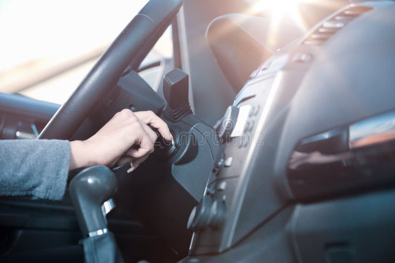 Woman starting car engine stock photo. Image of driving - 46738624