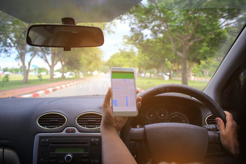 Female Driver Hands Holding the Car Steering Panel with Map Gps ...