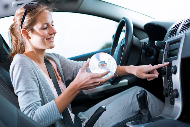 Female Driver Playing Music in the Car Stock Image - Image of road ...