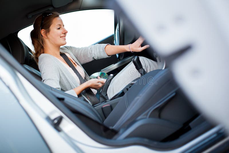 Female Driver Playing Music in the Car Stock Photo - Image of arms ...