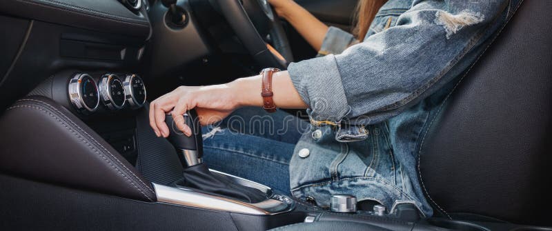 A Female Driver Shifting Automatic Gear Stick while Driving Car Stock ...