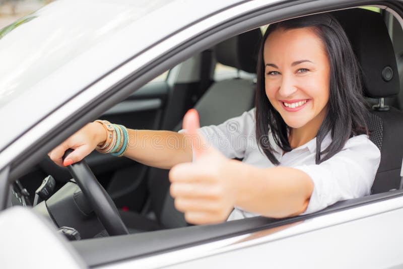 Female Driver Showing Thumbs Up Stock Image - Image of license, motor ...