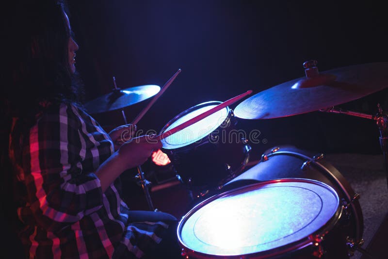 Female Drummer Practicing in Nightclub Stock Photo - Image of ...