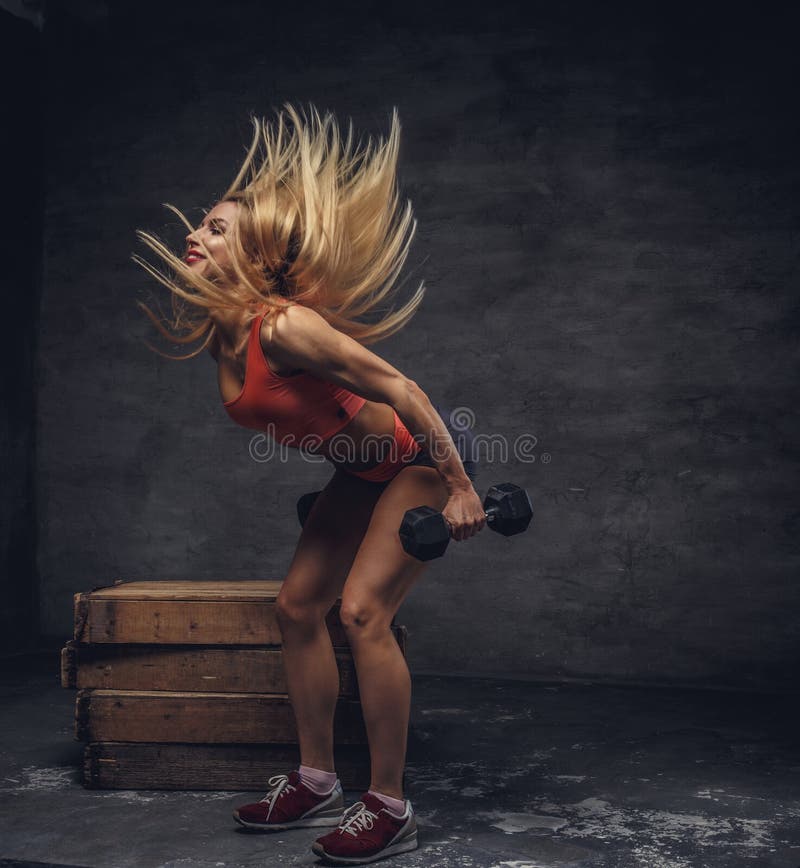 Female with Dumbbells in Action. Stock Photo - Image of lifestyles ...