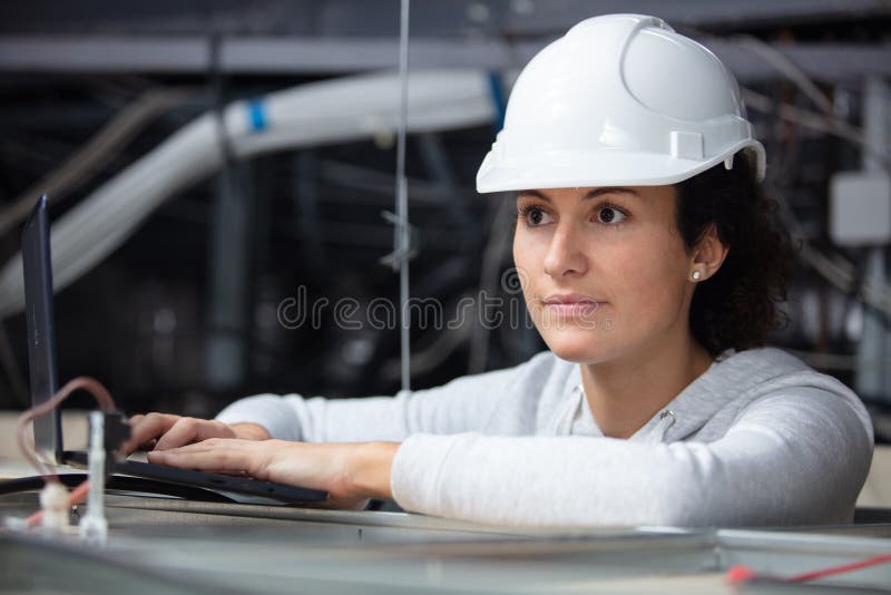 Female Electrician Fixing Ceiling Wiring Stock Image - Image of ...