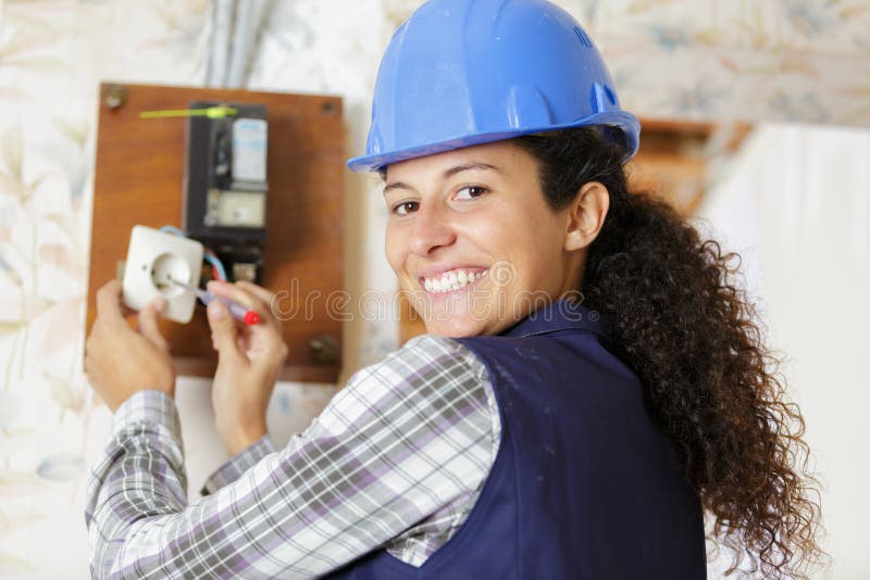 Female Electrician Inspects Electrical System Circuit Breaker Stock ...