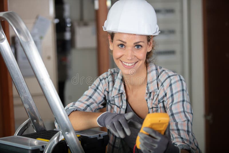 Female Electrician Testing Charge Electric Circuit Stock Photo - Image ...