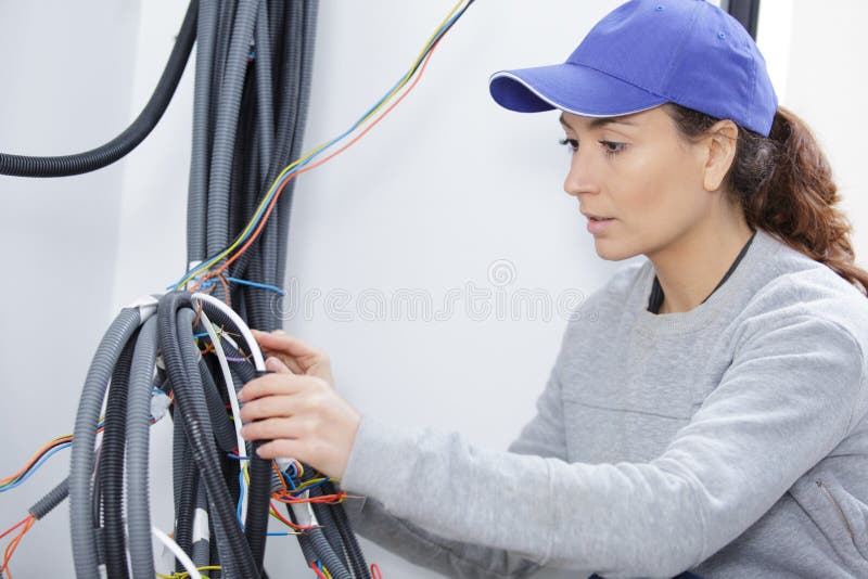 Female Electrician Working with Cables Stock Image - Image of ...