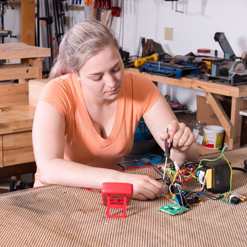 Female Electrician Working on Circuitboard Stock Photo - Image of human ...