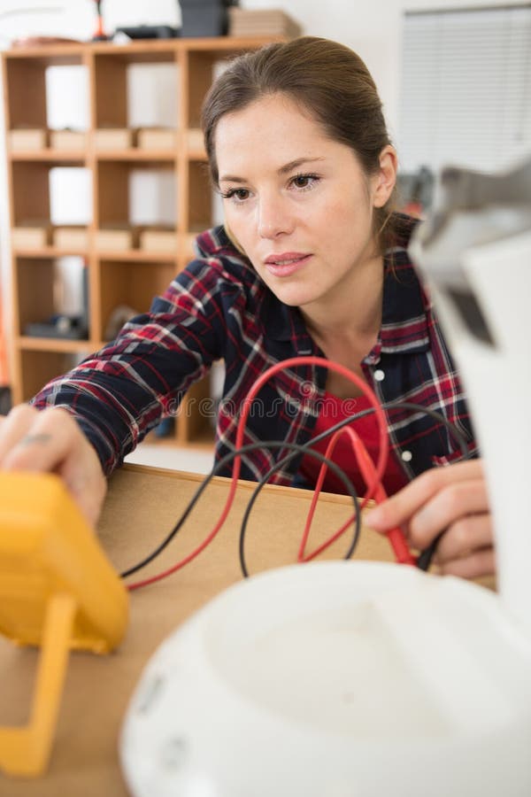 Female Electrician Working with Wires Stock Image - Image of headscarf ...