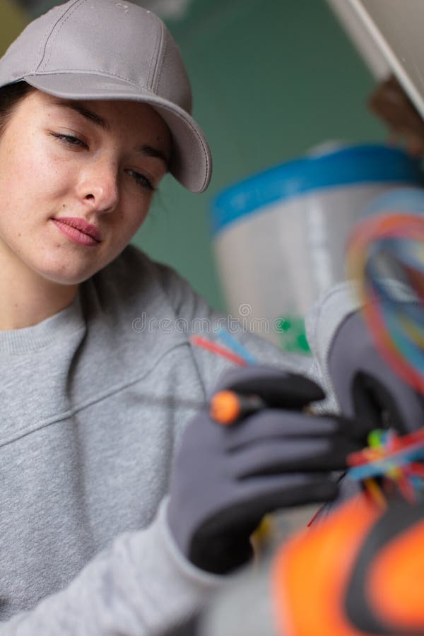 Female Electrician Working on Wiring Stock Photo - Image of energy ...