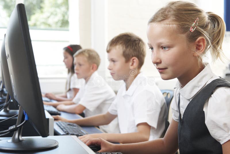 Female Elementary Pupil in Computer Class Stock Image - Image of class ...