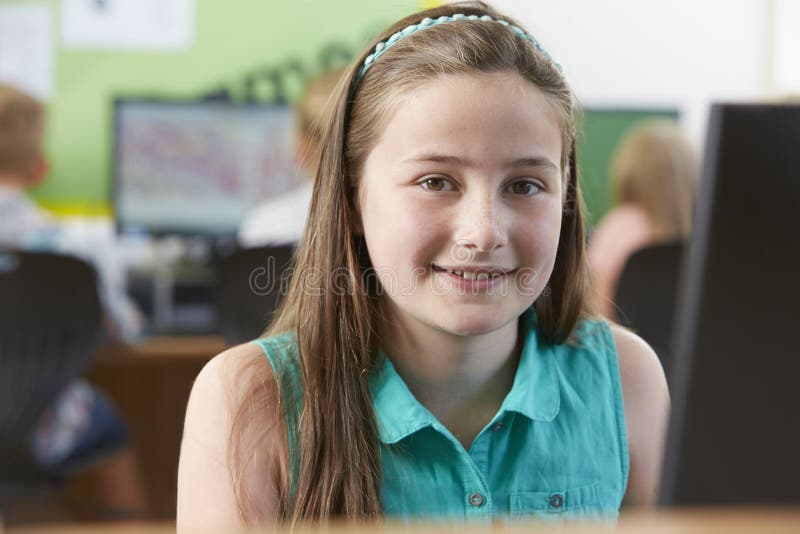 Female Elementary School Pupil in Computer Class Stock Photo - Image of ...