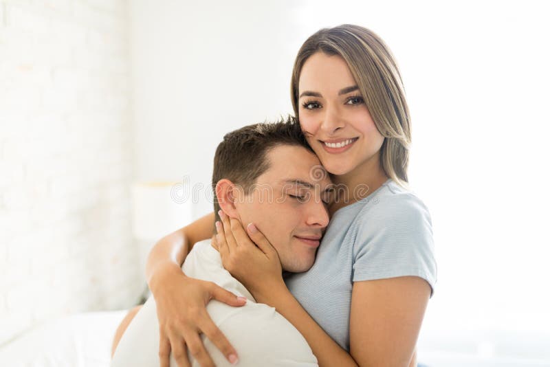Female Embracing Man with Affection at Home Stock Image - Image of ...