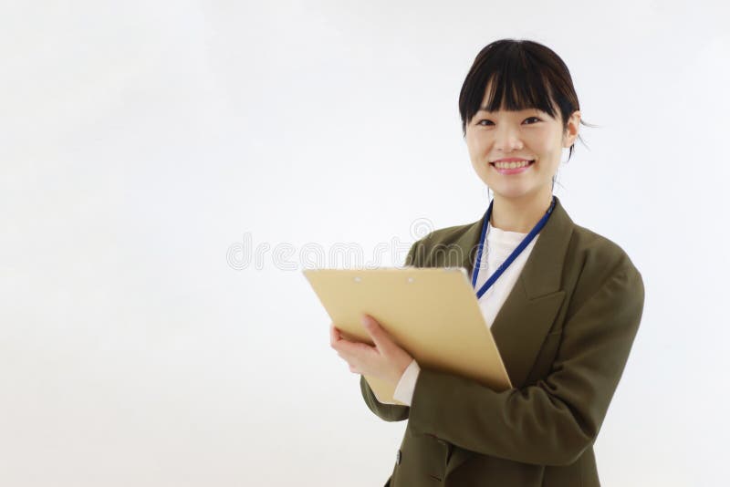 Female Employee with a Binder Stock Image - Image of woman, studio ...