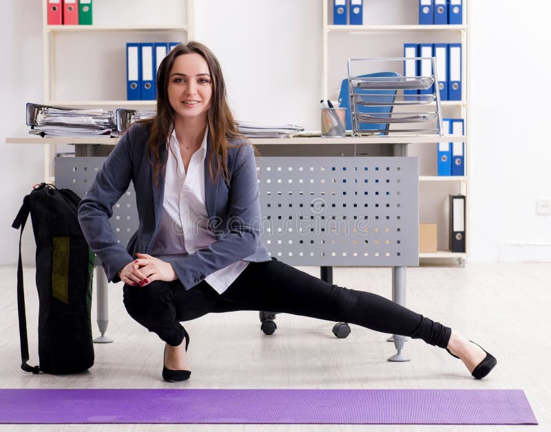 Female Employee Doing Sport Exercises in the Office Stock Photo - Image ...