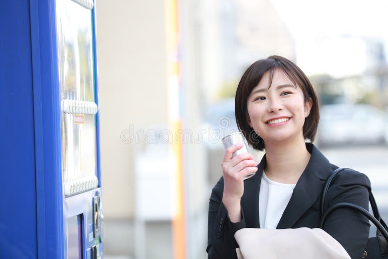 Female Employee Drinking a Drink Stock Photo - Image of refreshing ...