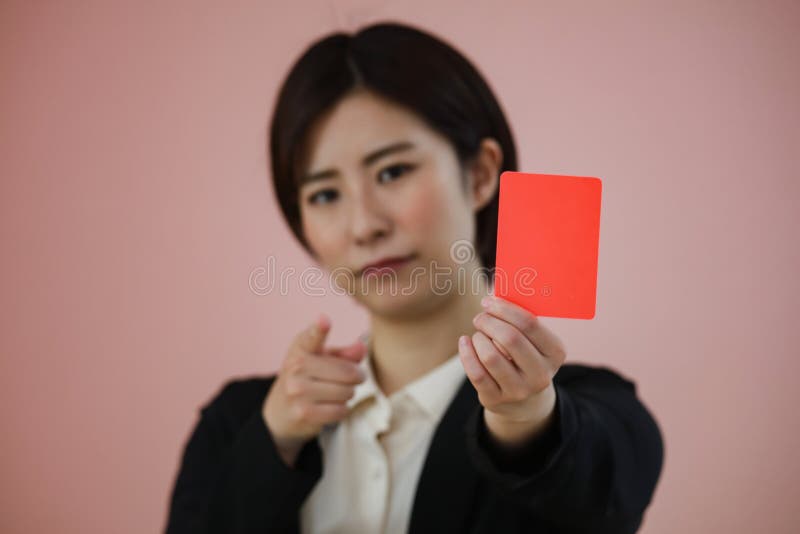 Female Employee Issuing a Red Card Stock Image - Image of person, card ...