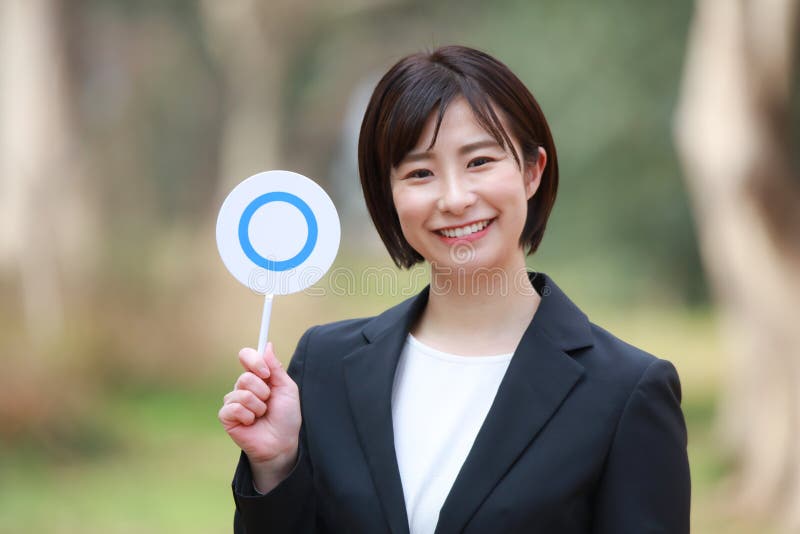 Female Employee with a Round Bill Stock Image - Image of suit ...