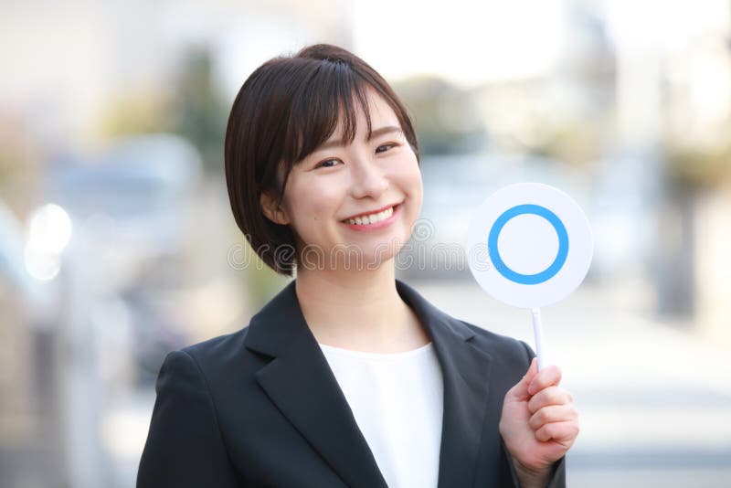 Female Employee with a Round Bill Stock Image - Image of cityscape ...