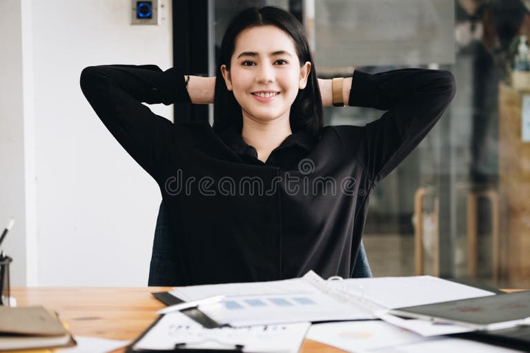 The Female Employee Shows a Smiley Face after Completing the Task at ...