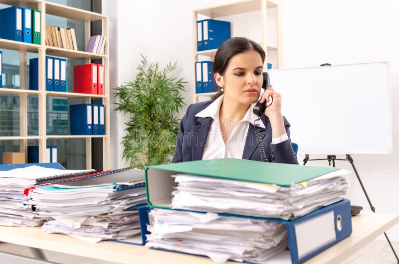 The Female Employee with Too Much Work in the Office Stock Photo ...