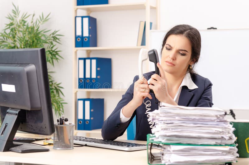 The Female Employee with Too Much Work in the Office Stock Image ...