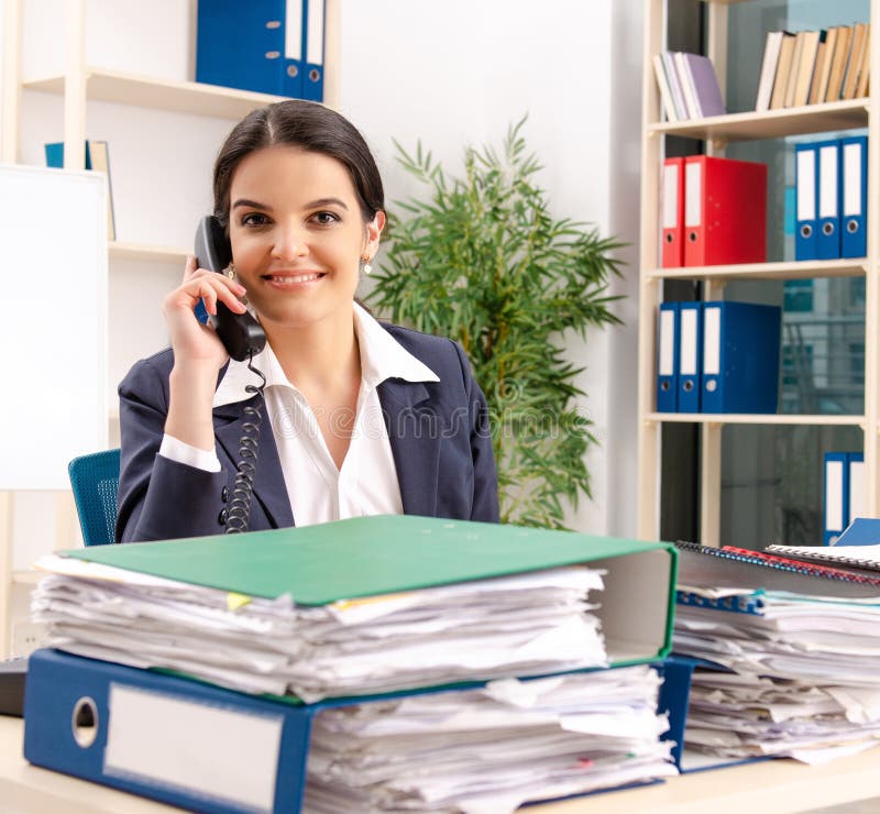 The Female Employee with Too Much Work in the Office Stock Image ...
