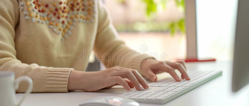 Female Employee Typing on Computer Keyboard on White Office Desk in ...