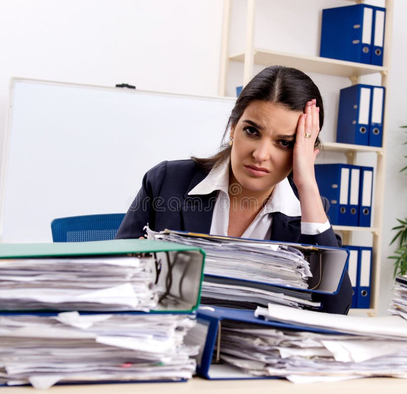 Female Employee Unhappy with Excessive Work Stock Image - Image of ...