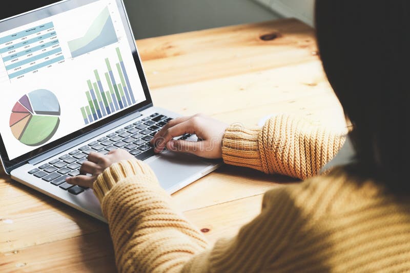 A Female Employee Using Computer To Check the Company S Investment ...