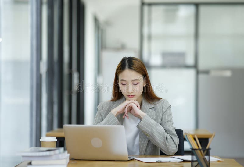 Female Employees are Stressed and Tired. Headache from Thinking and ...