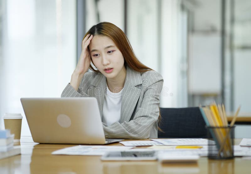 Female Employees are Stressed and Tired. Headache from Thinking and ...