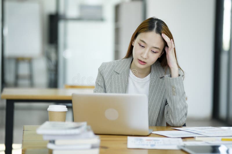 Female Employees are Stressed and Tired. Headache from Thinking and ...