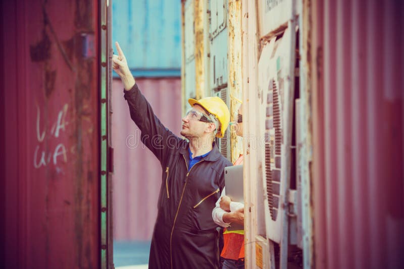 Female Engineer Checking Containers Box with Worker Man from Cargo ...