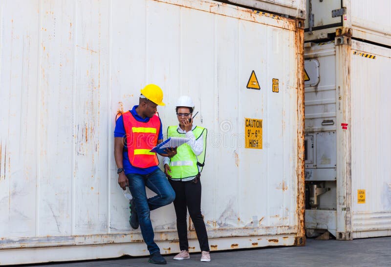 Female Engineer Checking Containers Box with Worker Man from Cargo ...