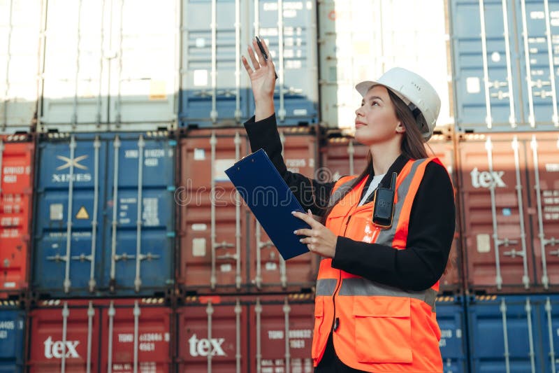 Female Engineer with Clip- Folder Wearing White Helmet and Vest in ...