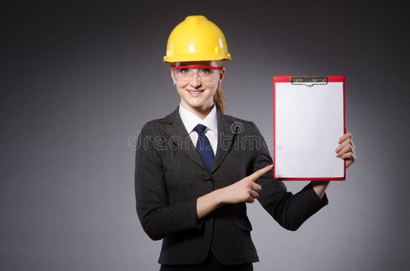 Female Engineer with Helmet Isolated on Gray Stock Photo - Image of ...
