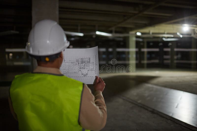 Female Engineer Inspecting Building Base Stock Photo - Image of ...