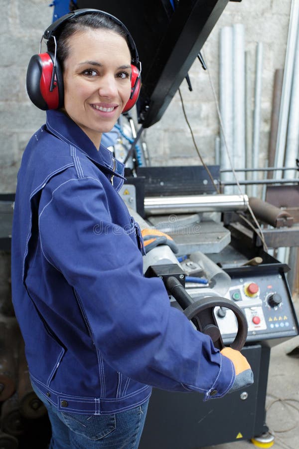 Female Engineer Operating Plant Machinery Stock Photo - Image of teen ...