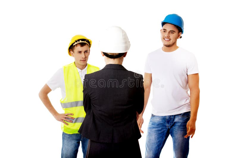 Female Engineer Talking with Two Builders Stock Image - Image of ... Female Engineer Talking with Two Builders Stock Image - Image of ...